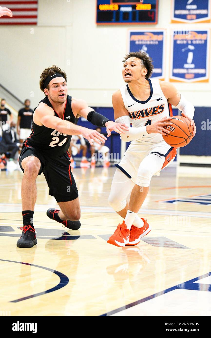 MALIBU, CA - JANUARY 30: Pepperdine guard Colbey Ross (4) drives past ...