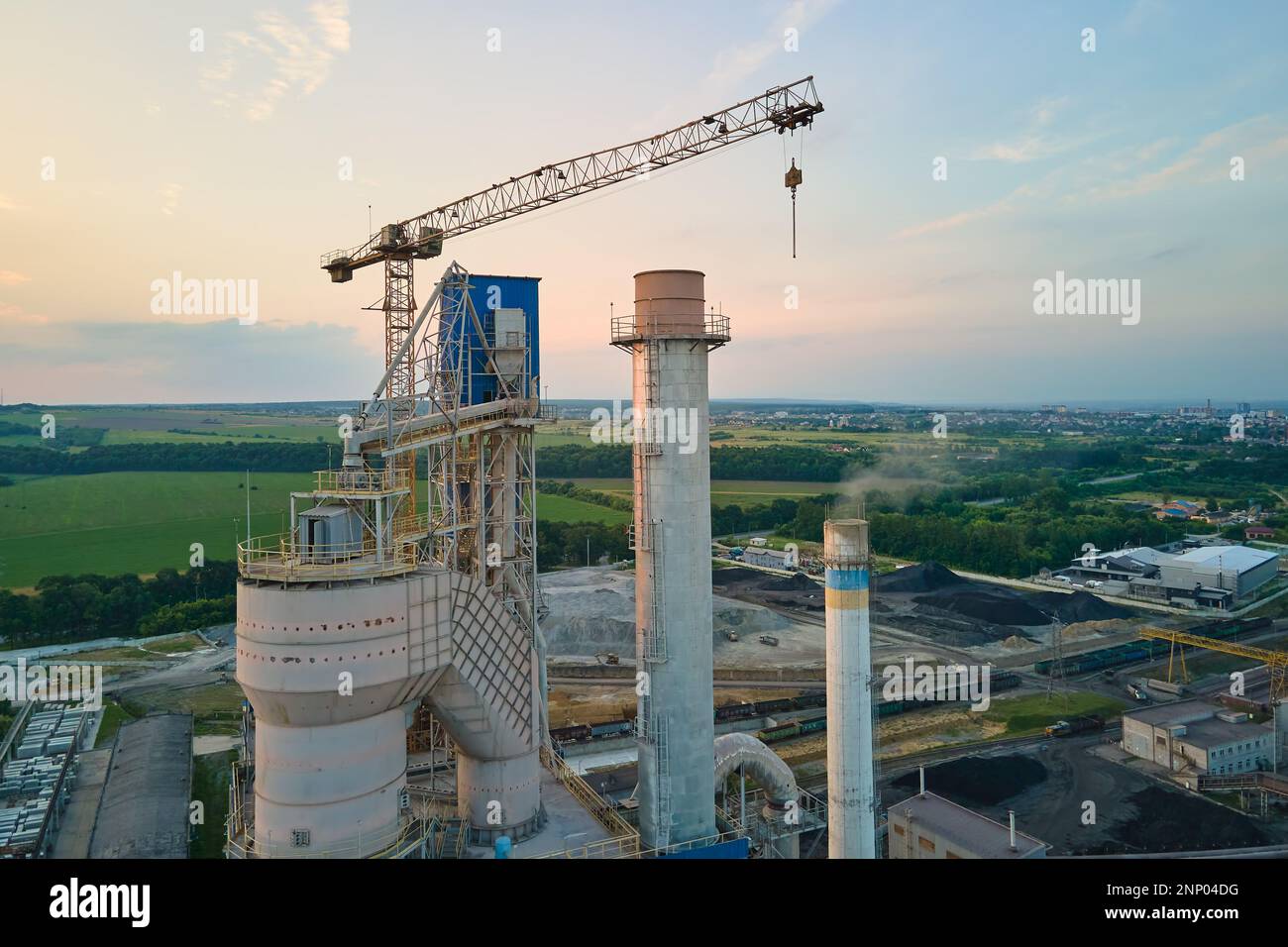 Aerial view of cement factory with high concrete plant structure and ...