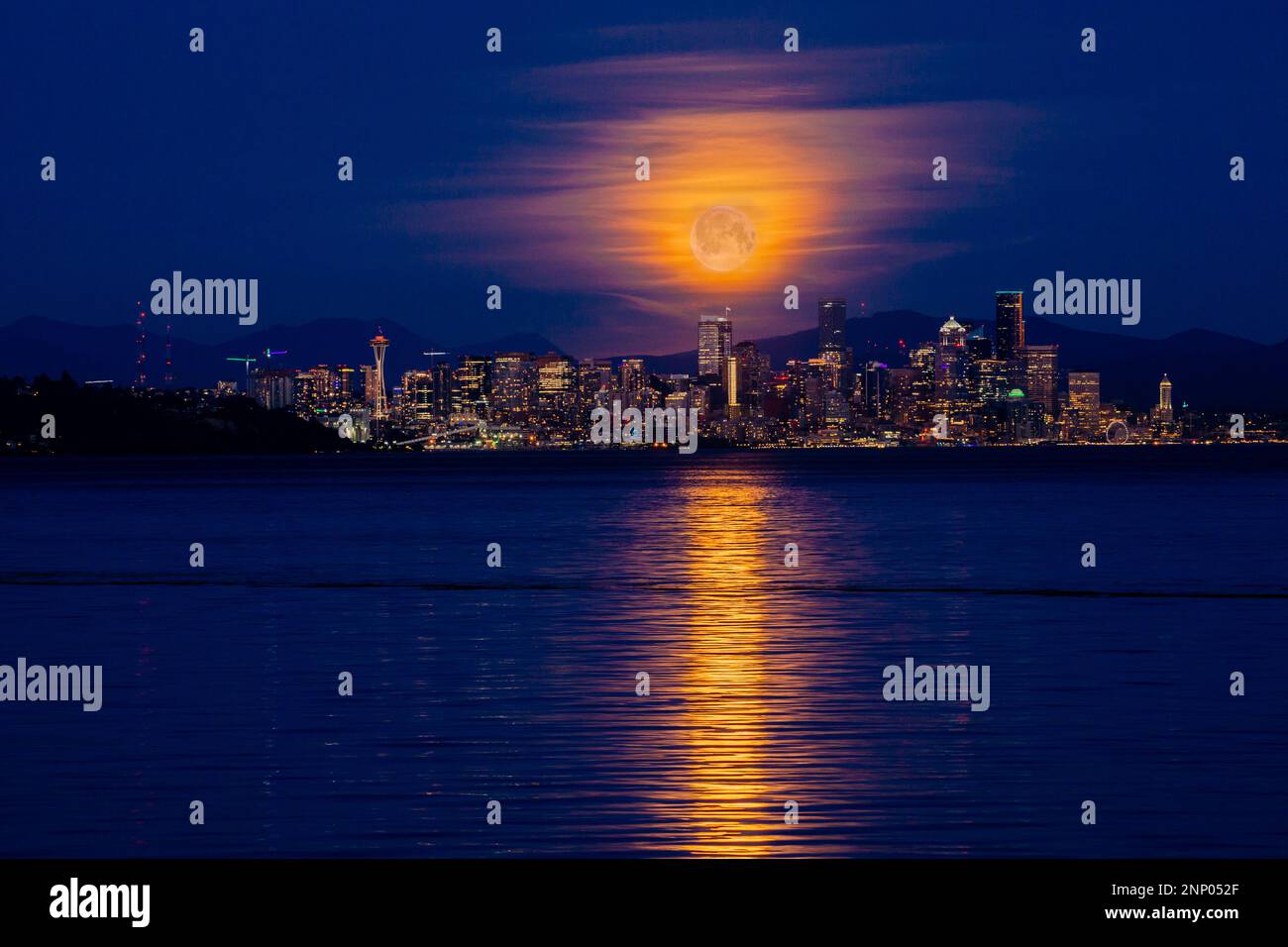 Moon over skyline of Seattle at night, Washington State, USA Stock ...