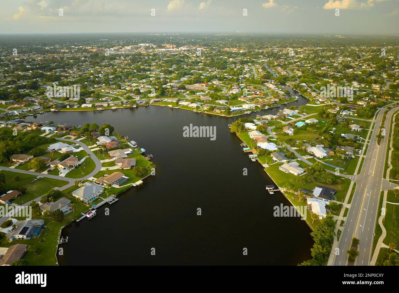 Aerial view of rural private houses in remote suburbs located on sea ...