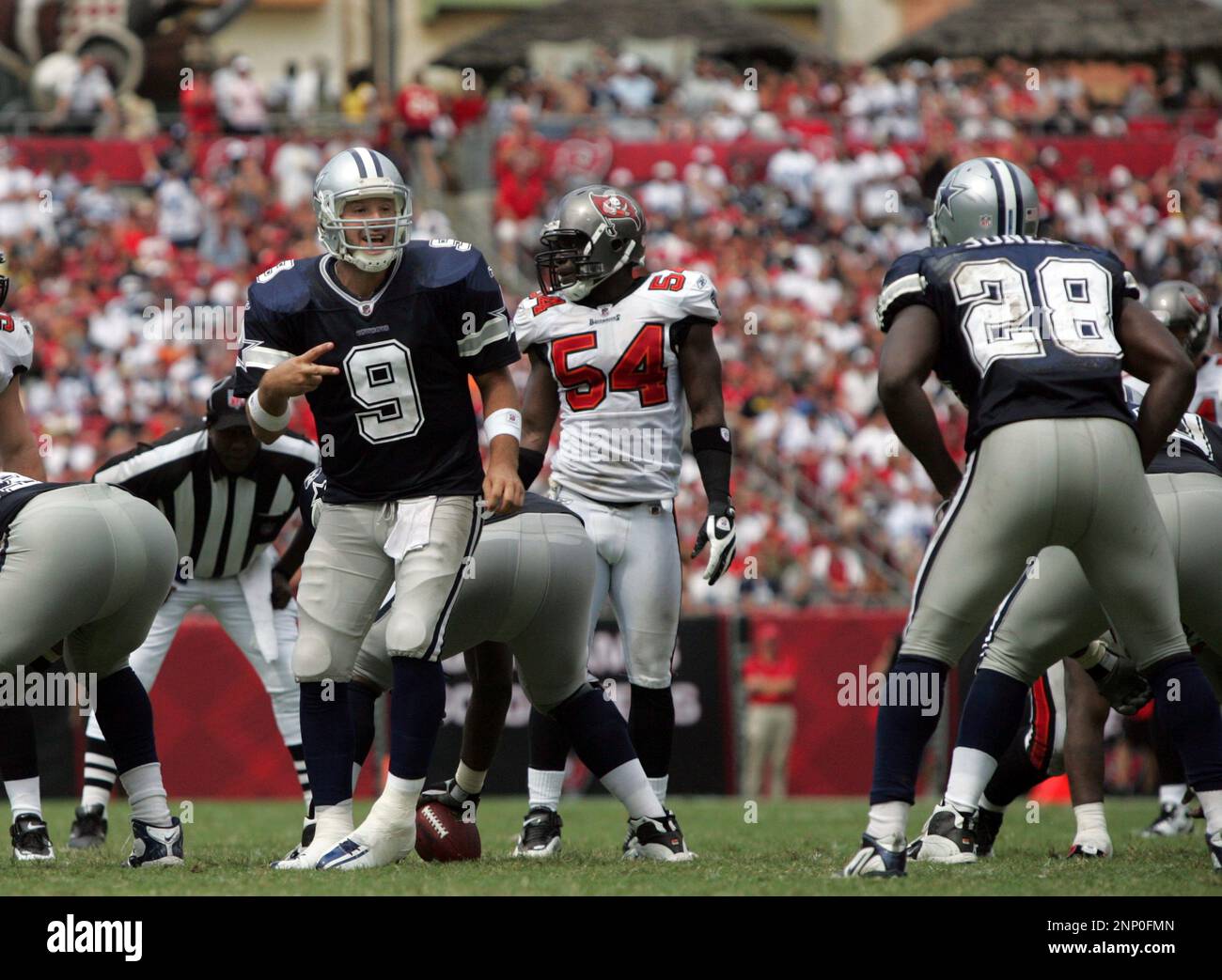 13 SEP 2009: Quarterback Tony Romo of the Dallas Cowboys signals the ...