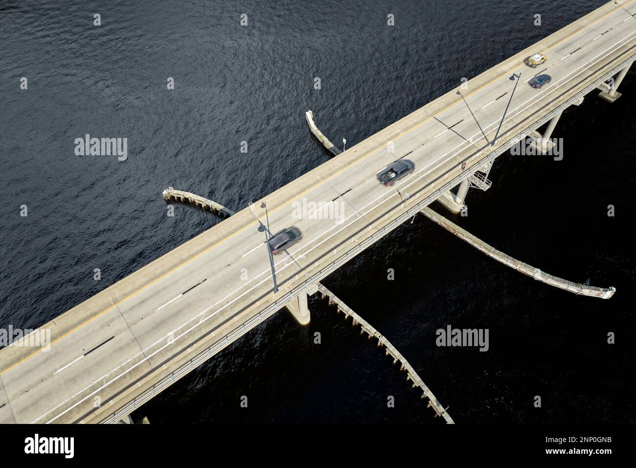 Barron Collier Bridge and Gilchrist Bridge in Florida with moving ...