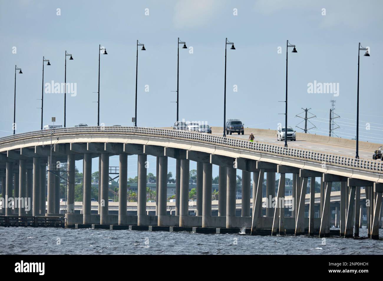 Barron Collier Bridge and Gilchrist Bridge in Florida with moving ...