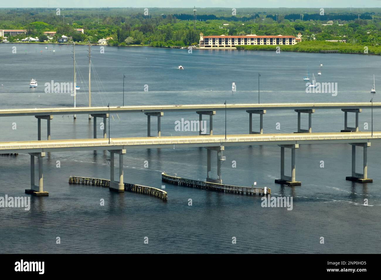 Barron Collier Bridge and Gilchrist Bridge in Florida with moving ...