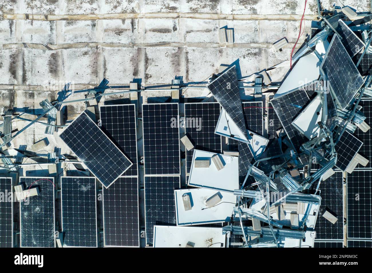 Broken down photovoltaic solar panels destroyed by hurricane Ian winds ...