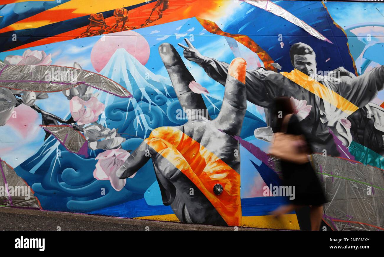 A photo shows a mural painted on the outer wall of the German Embassy ...