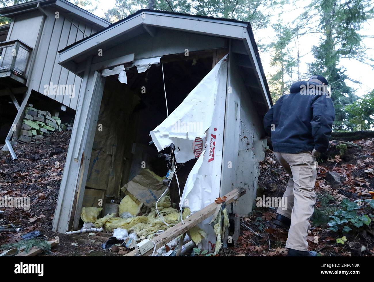 Steamboat Inn owner Travis Woodward walks past the valve house, the ...