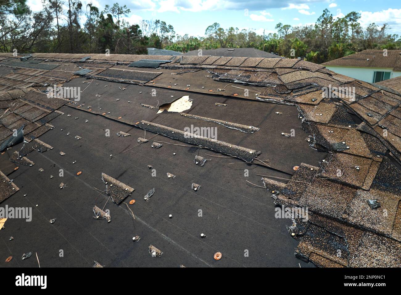 Roof house damaged typhoon in hi-res stock photography and images - Alamy