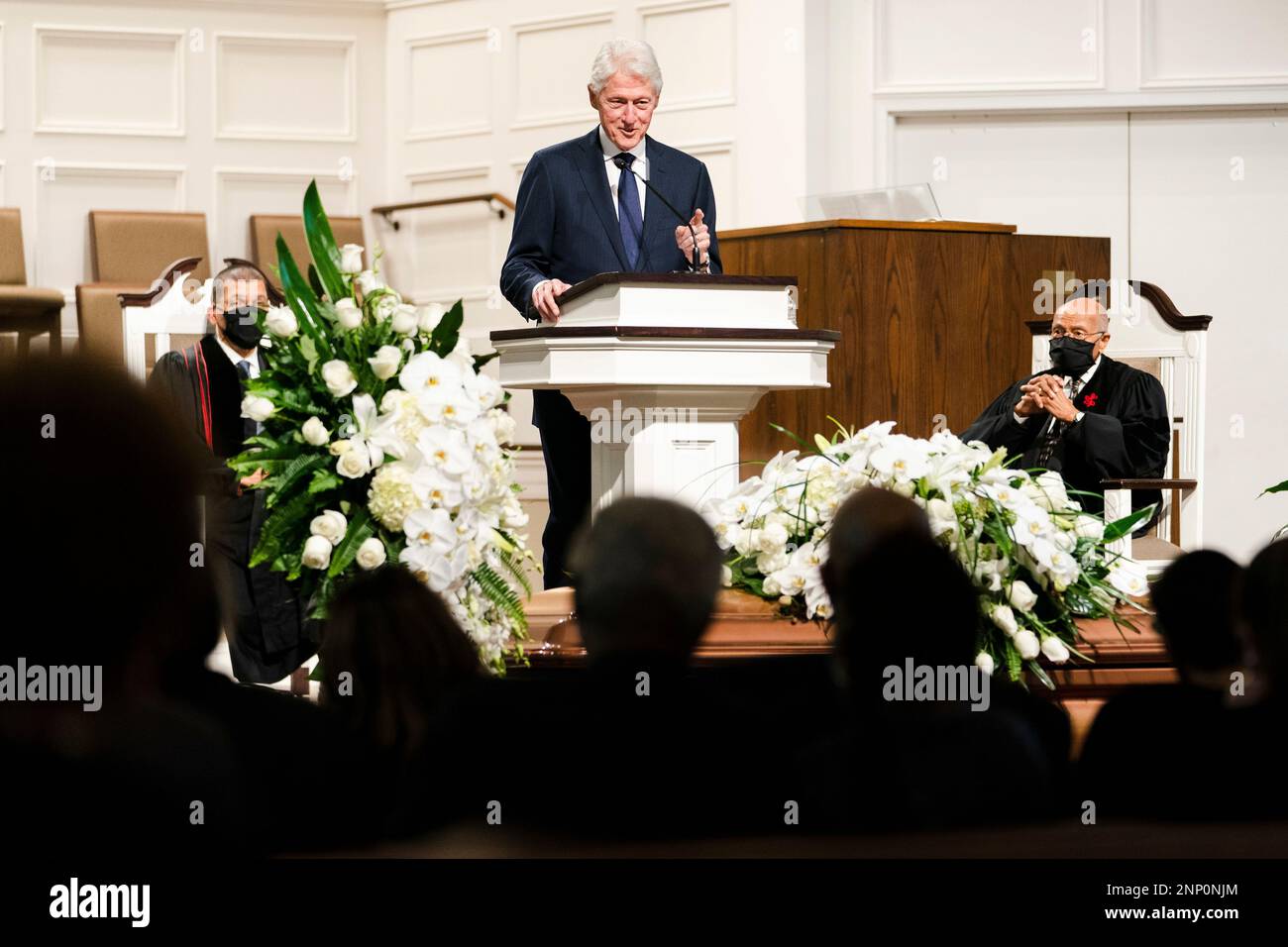 Former President Bill Clinton speaks during funeral services for Henry ...
