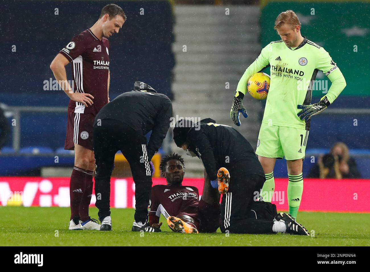 Leicester's Wilfred Ndidi is injured during the English Premier League ...