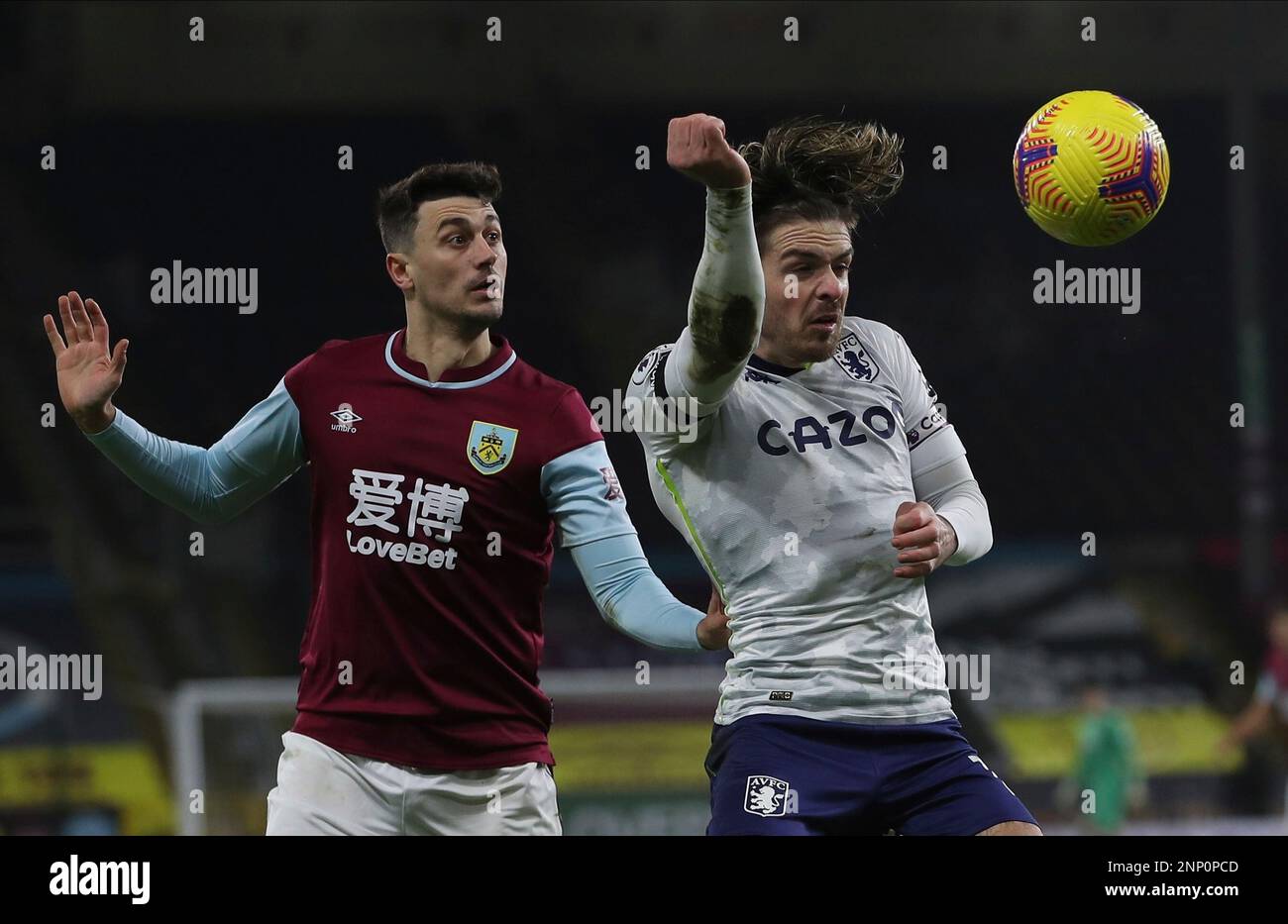 Aston Villa's Jack Grealish, right, and Burnley's Matthew Lowton ...