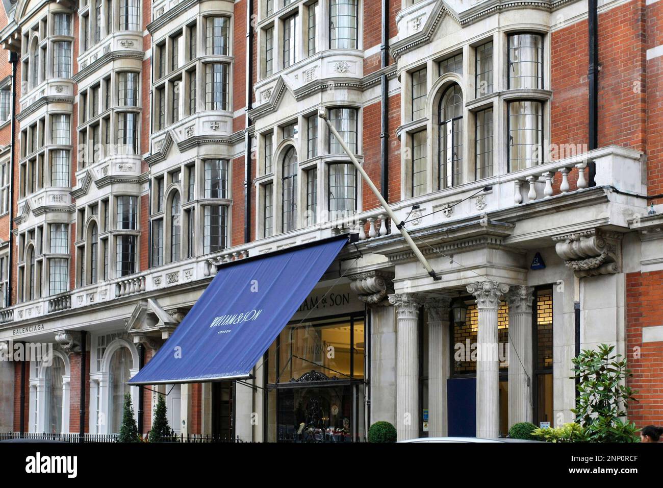 London, England - Front of elegant stores with leaded glass bay window ...