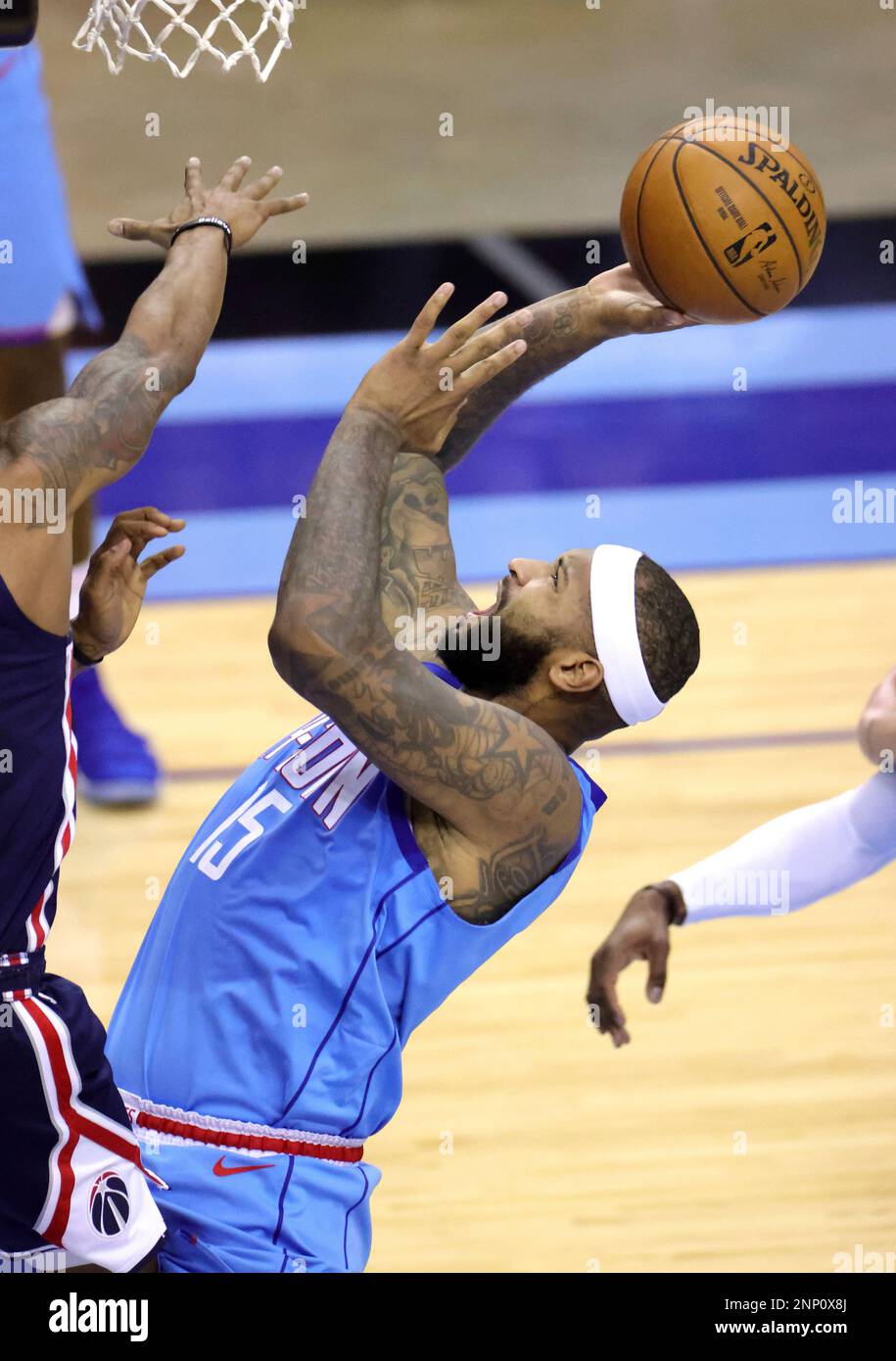 Houston Rockets' DeMarcus Cousins shoots against the Washington Wizards ...