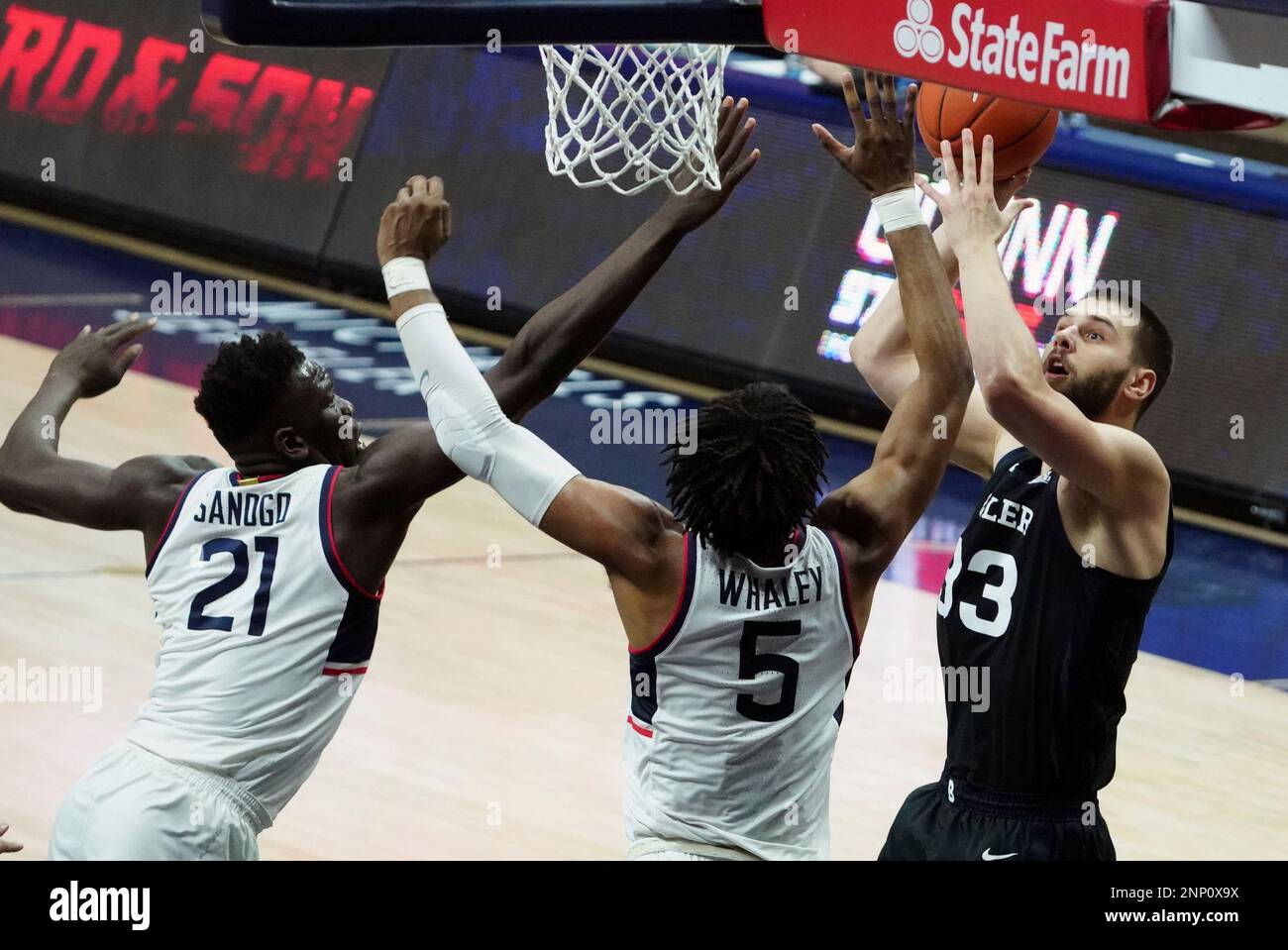 Butler forward Bryce Golden (33) shoots against Connecticut forward ...