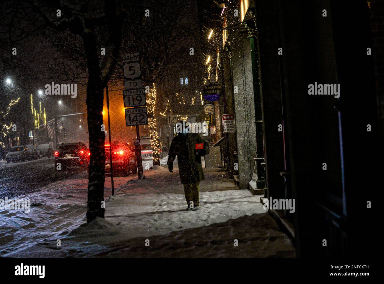 Chris Chapman, of Brattleboro, Vt., walks up Main Street, in ...