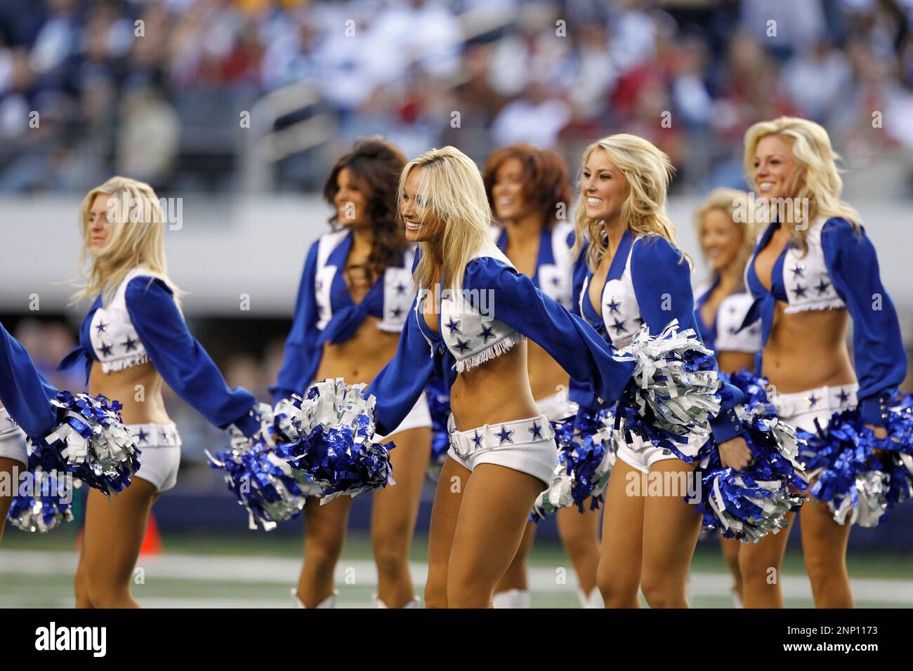 19 December 2010: Showing their teeth a group of Dallas cheerleaders ...