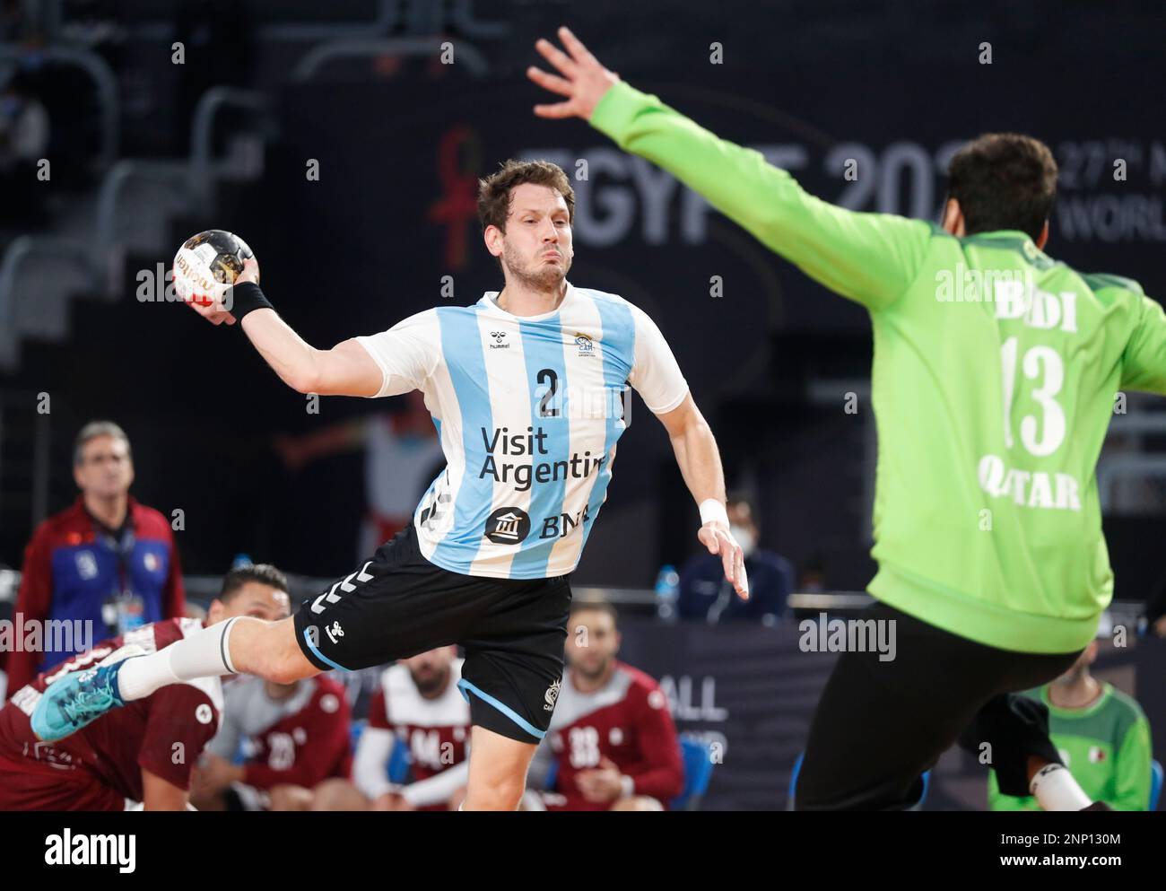 Argentina's Federico Gaston Fernandez shoots by Qatar's Mohamed Abidi ...
