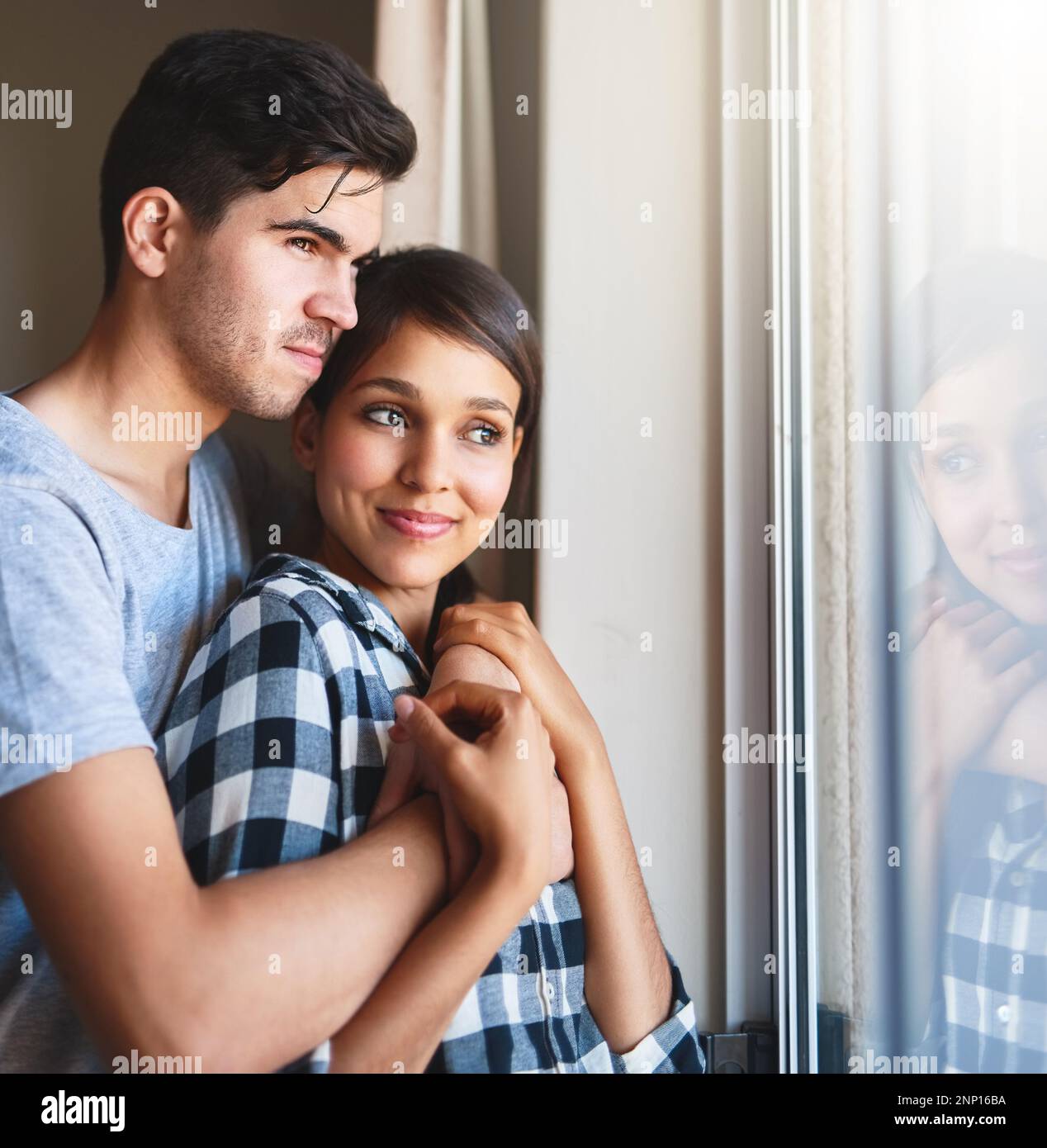 The future is looking bright. a happy young couple celebrating their ...