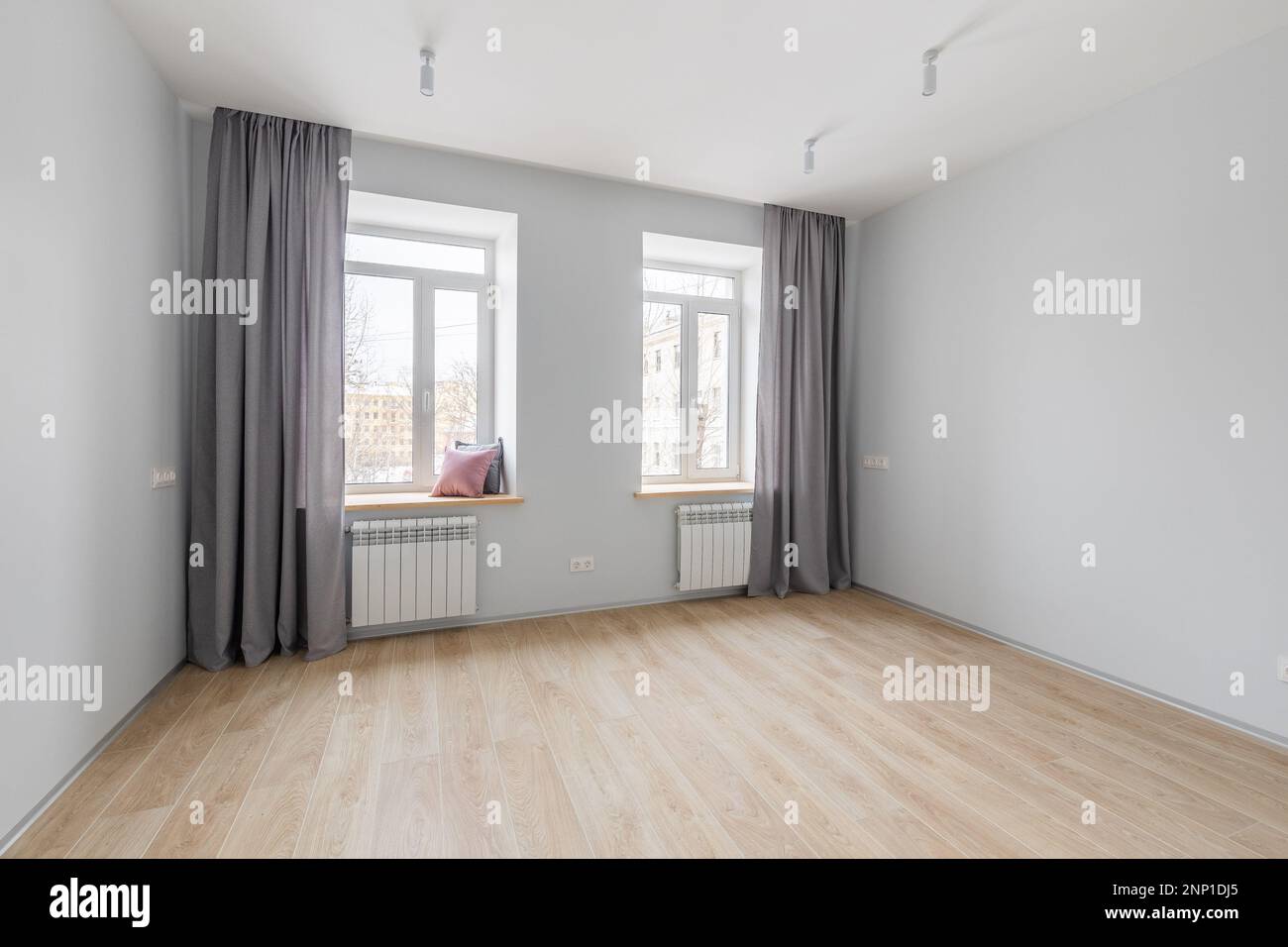 Empty gray room ready for people to move in Stock Photo - Alamy