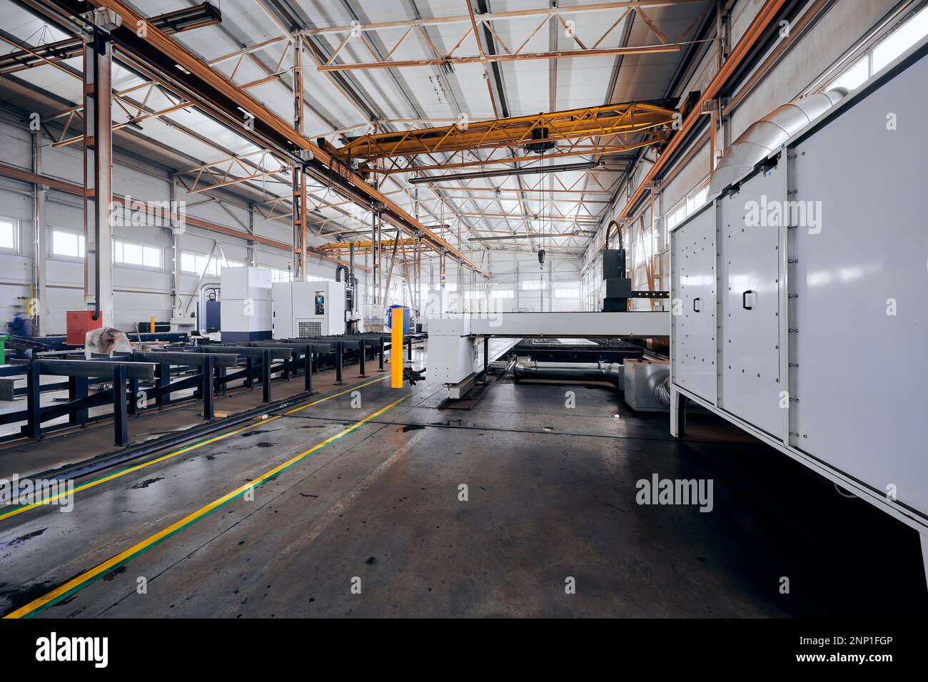 Metal sheets processing workshop with modern equipment Stock Photo - Alamy