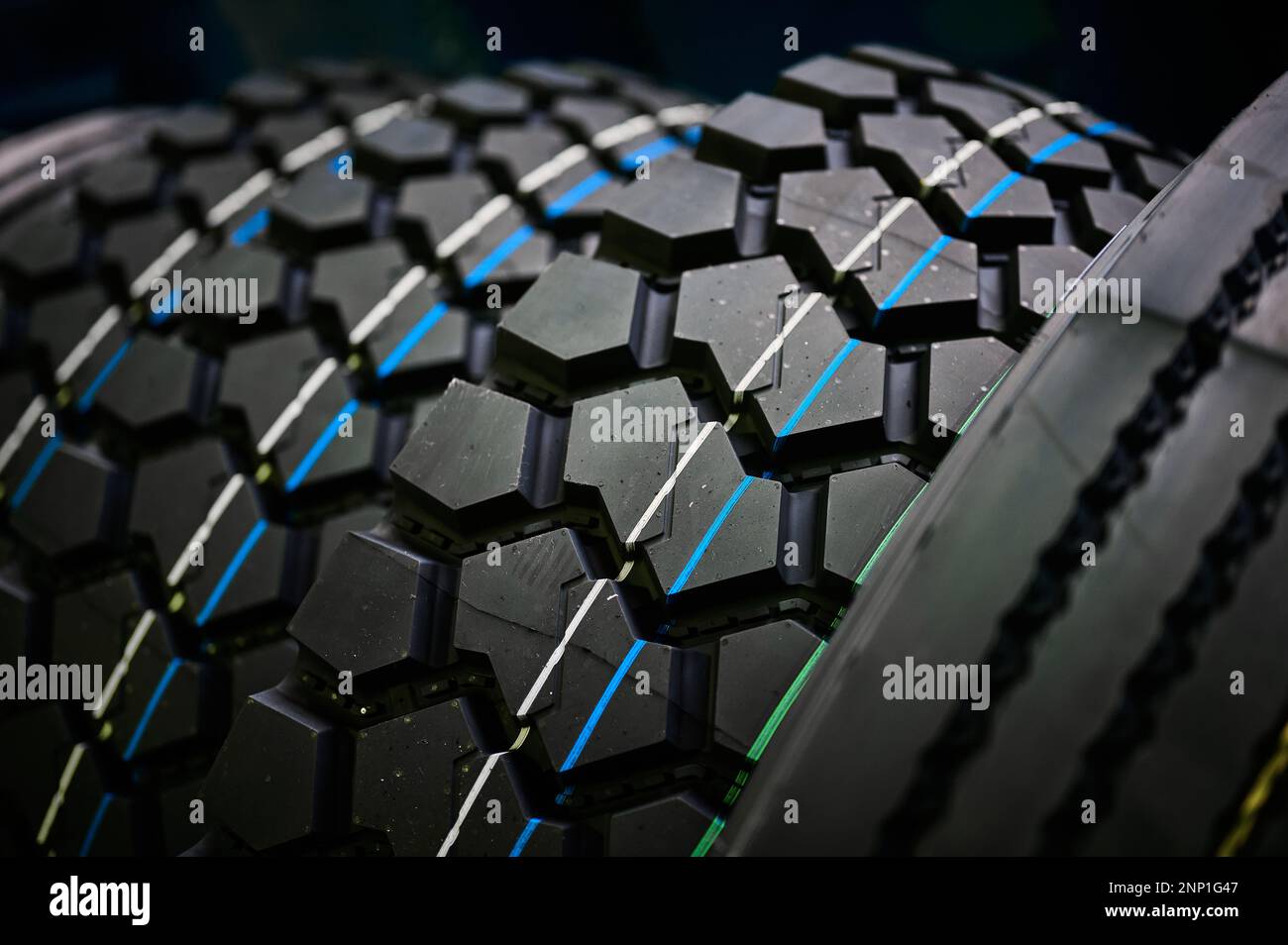 Tyres with white and blue markings after vulcanization Stock Photo - Alamy
