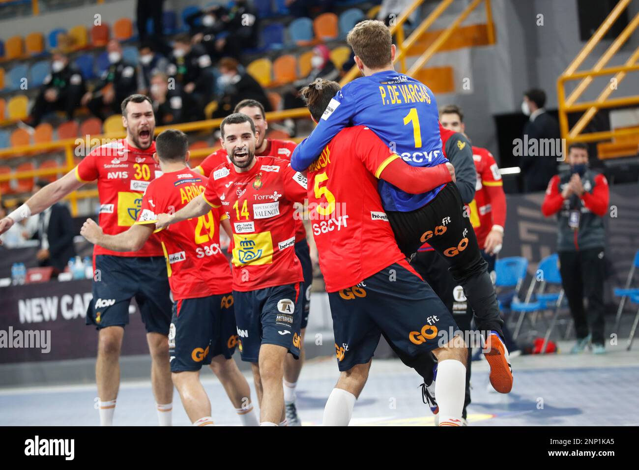 Spain's players celebrate victory of Germany during the World Handball ...