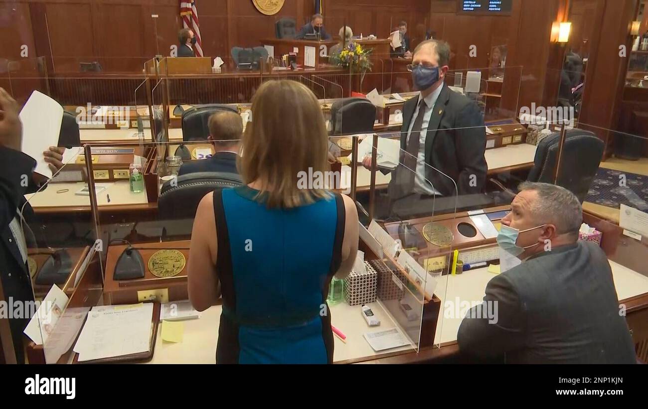 Alaska state Sens. Jesse Kiehl, upper right, and Mike Shower, lower ...