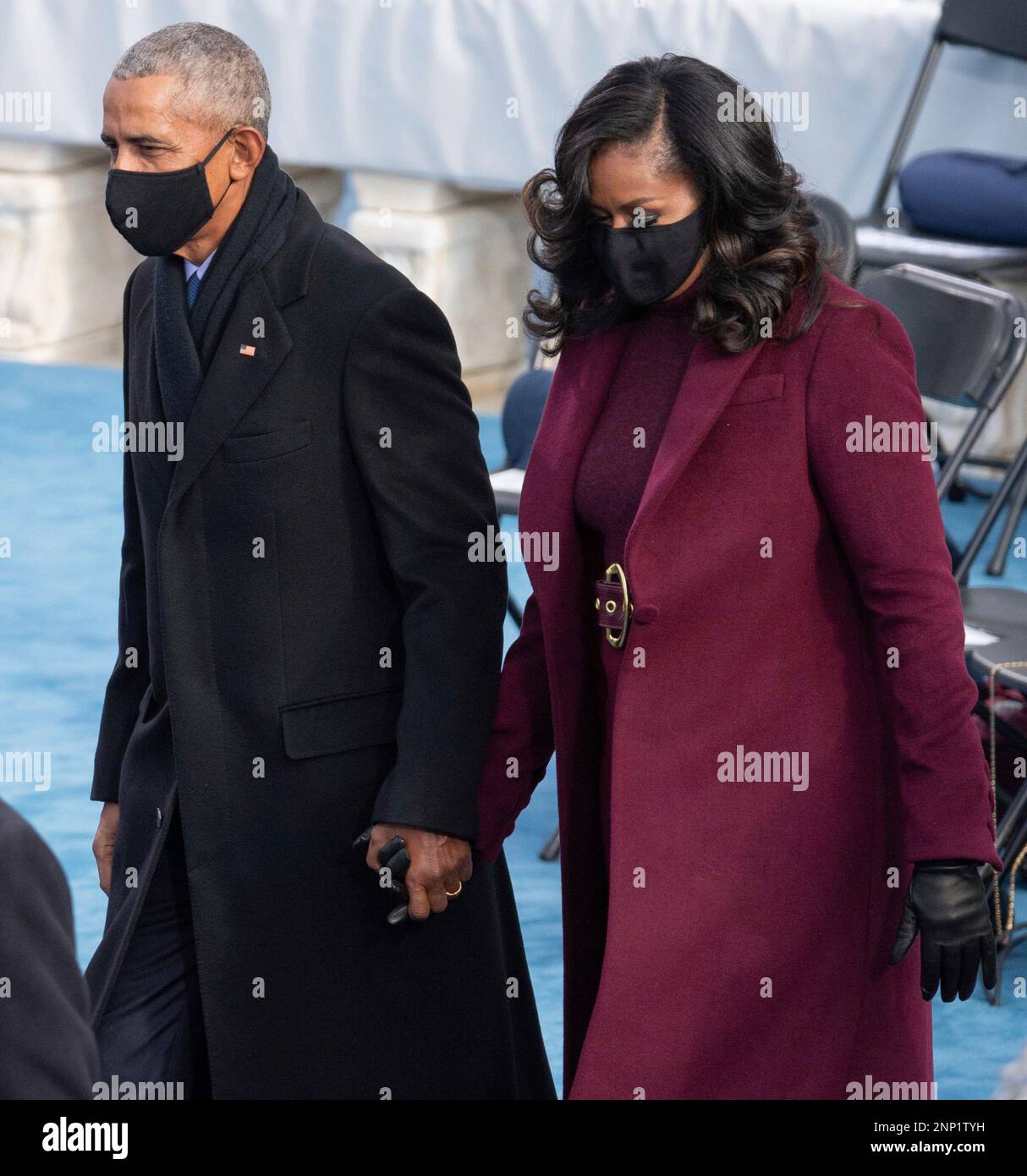 Former President Barack Obama and his wife Michelle arrive for the ...