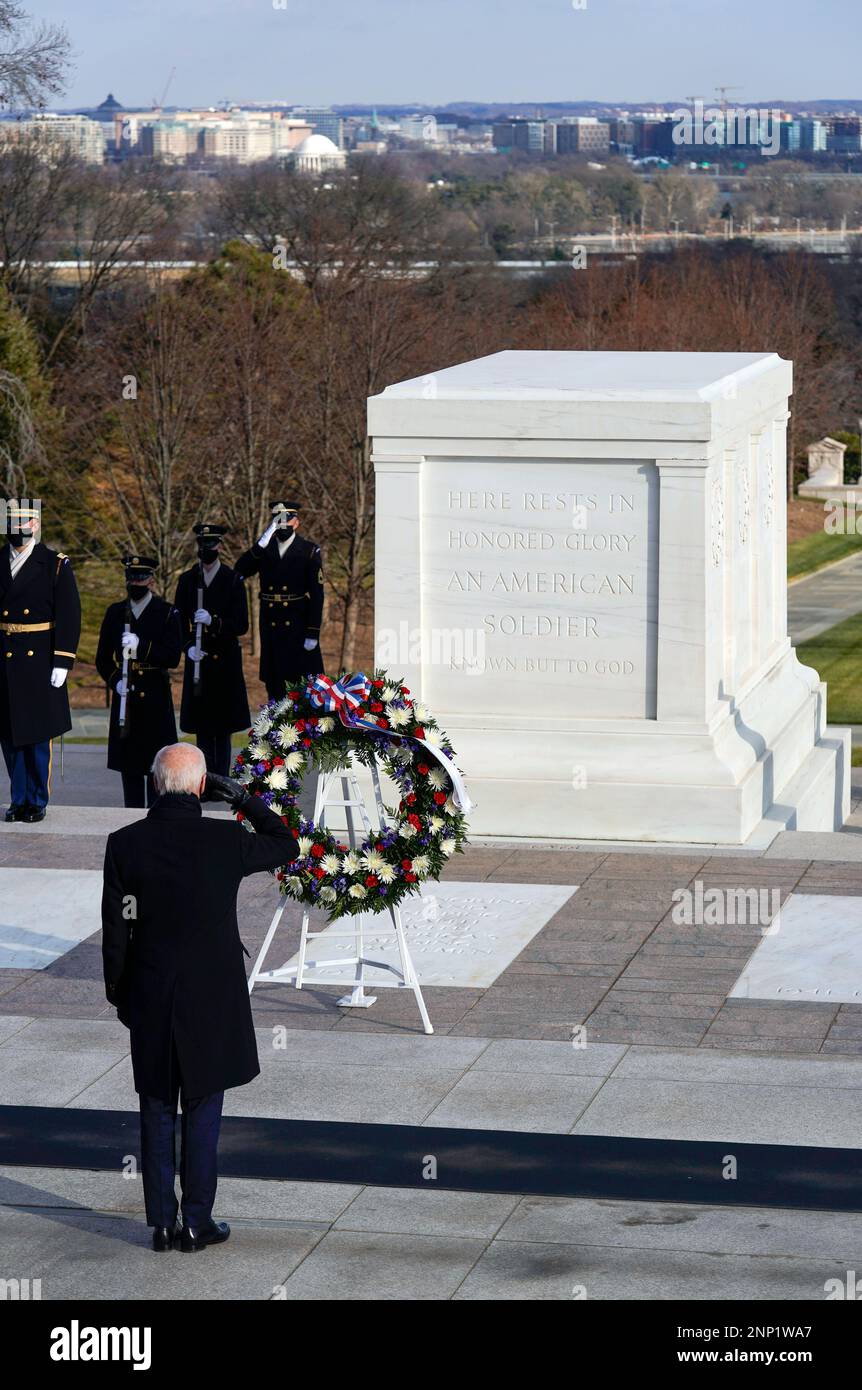President Joe Biden salutes at the Tomb of the Unknown Soldier at the ...