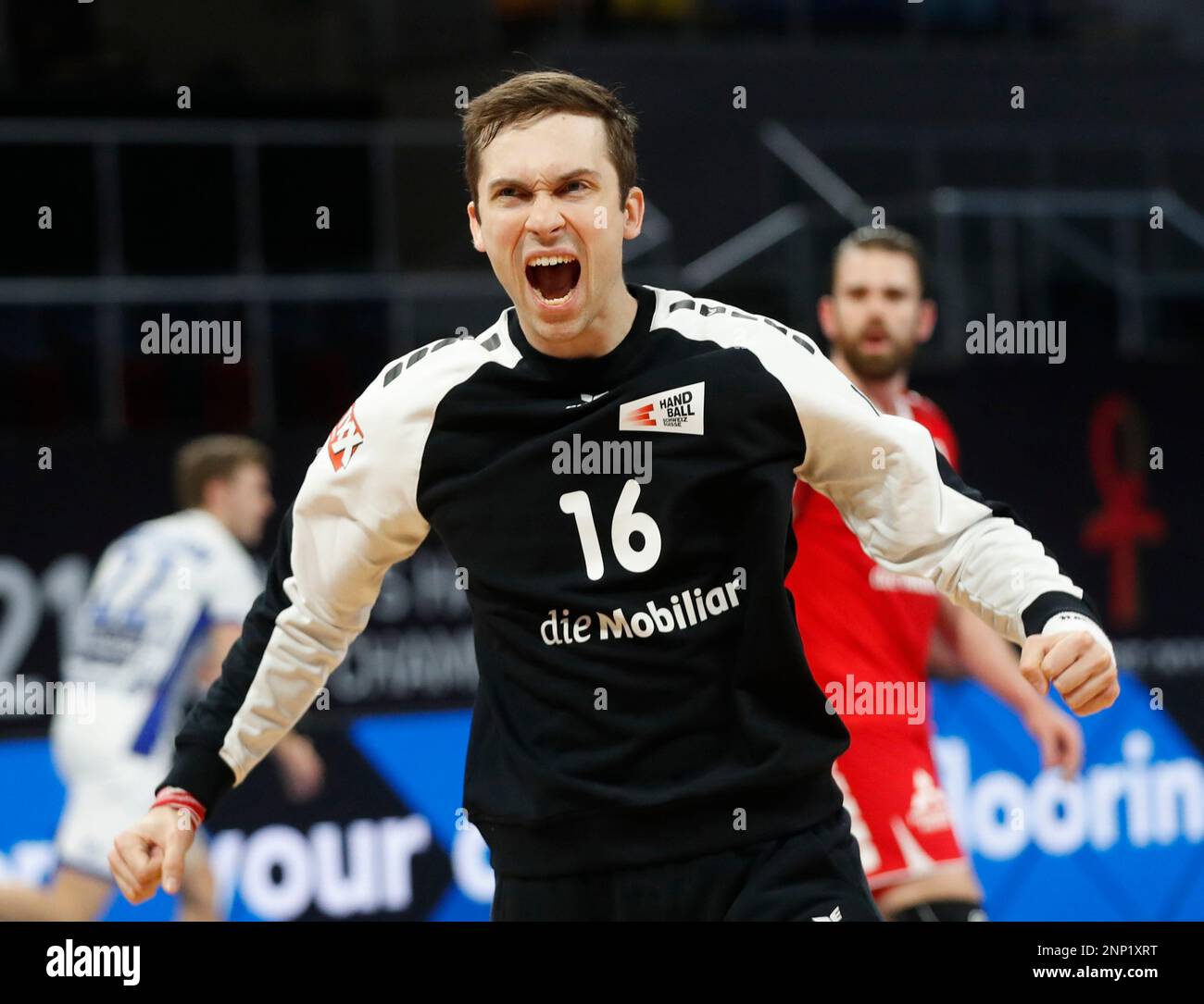 Switzerland's goal keeper, Nikola Portner, celebrates after saving a ...