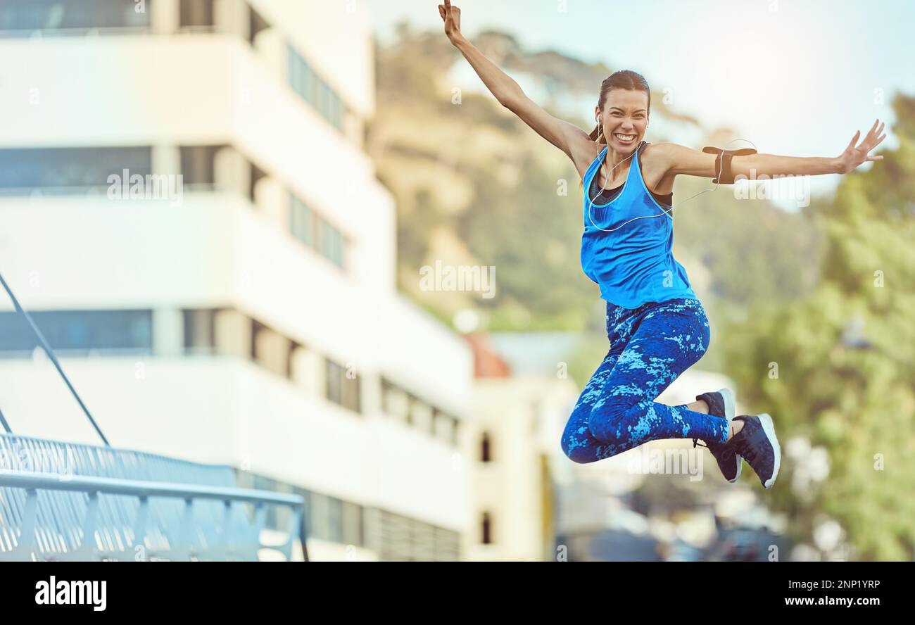 Dont let anyone tell you that you cant. a young woman jumping in mid ...