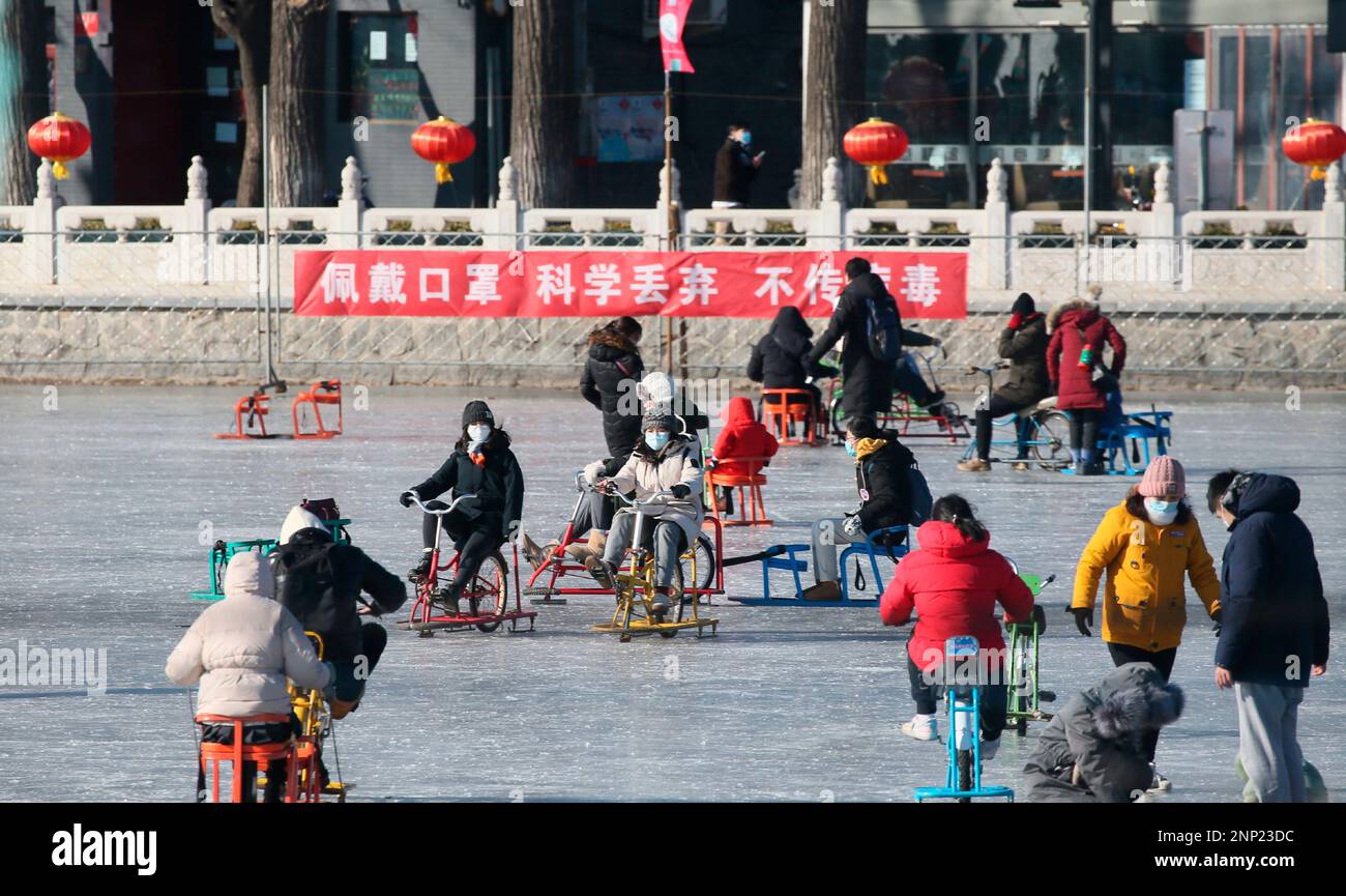 People wearing masks enjoy skating at Shichahai Ice Link， also known ...