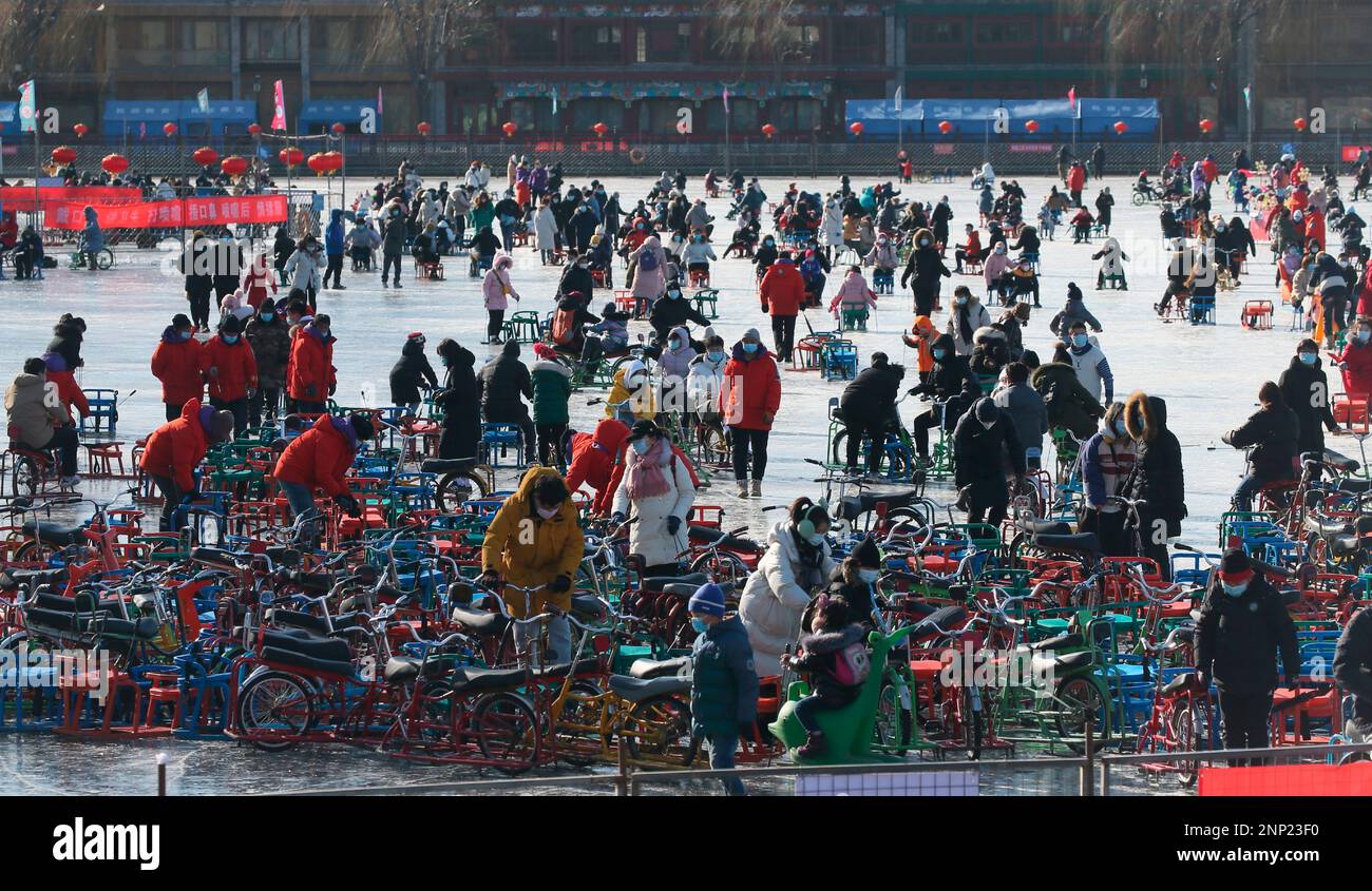 People wearing masks enjoy skating at Shichahai Ice Link， also known ...