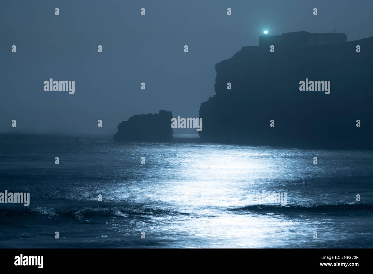 Nazare lighthouse on cliff, Nazare, Portugal Stock Photo - Alamy