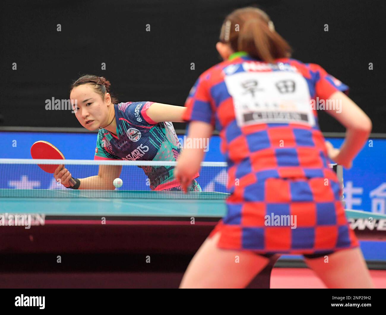 Japanese table tennis player Mima Ito hits a ball during the semifinal ...