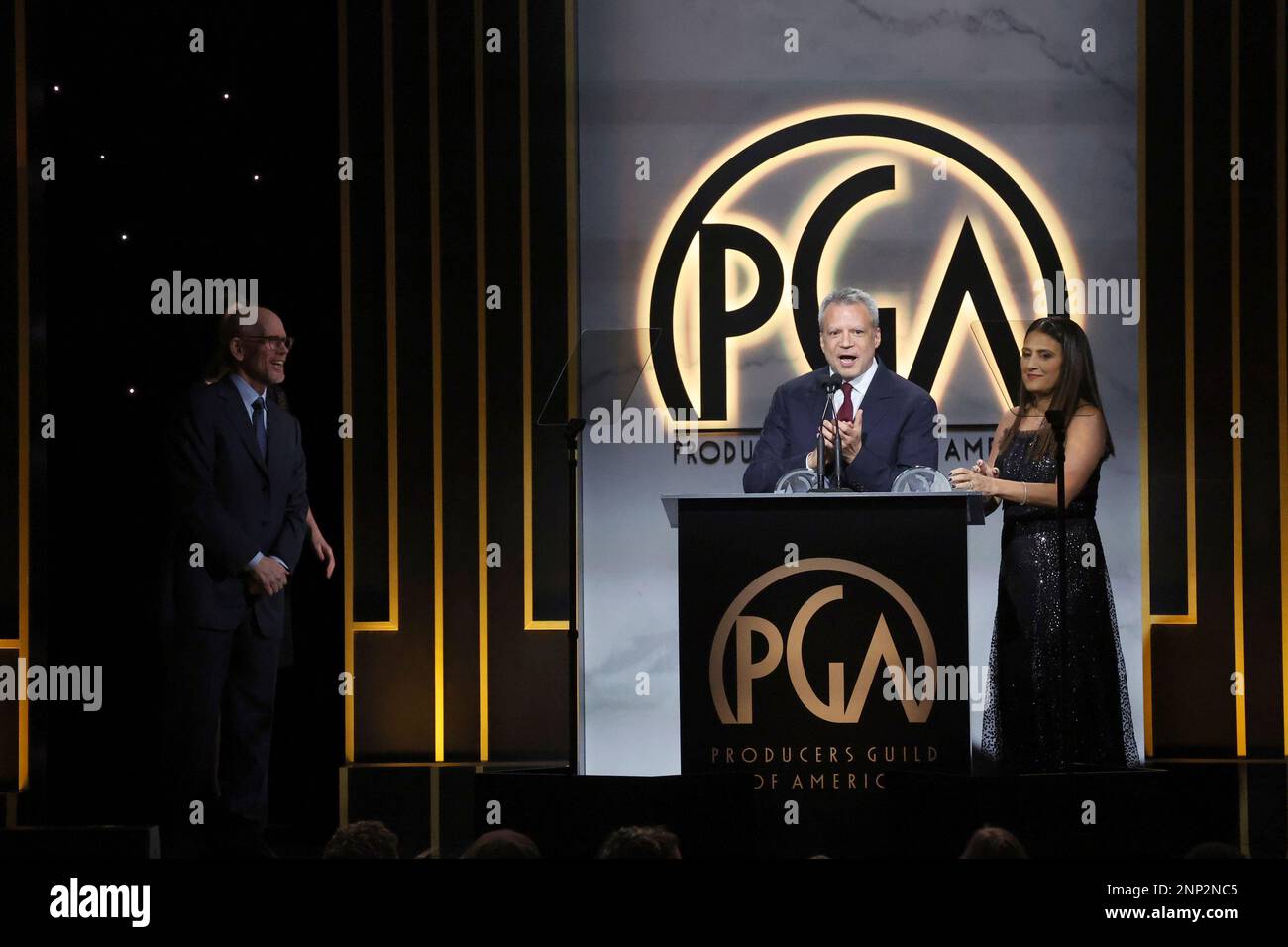 Ron Howard, left, Michael De Luca, and Pam Abdy on stage at the 34th ...