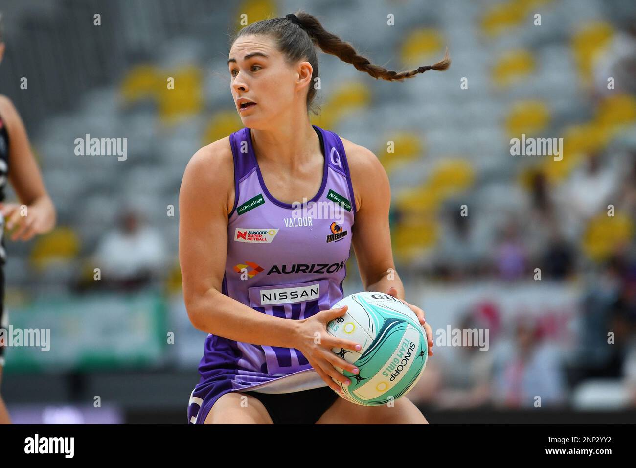 Macy Gardner of the Firebirds catches the ball during the Super Netball ...