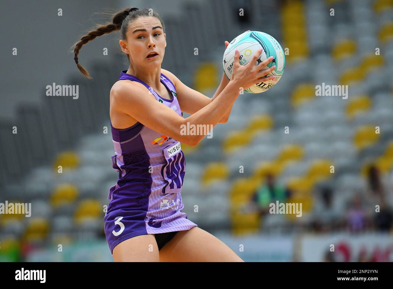 Macy Gardner of the Firebirds catches the ball during the Super Netball ...