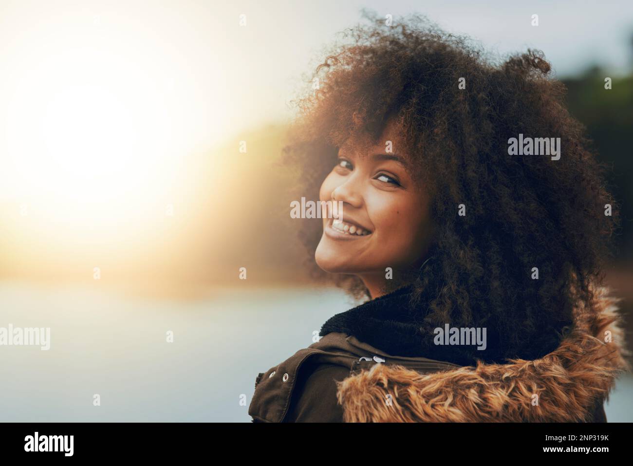 Its my favourite kind of weather. Portrait of a beautiful young woman ...
