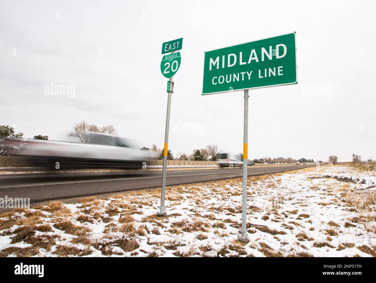 Snow is seen at the Midland County line on Business 20 between Odessa ...