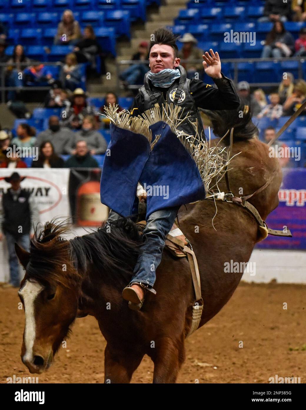 Mitchell Parham competes in bareback riding during the opening night of ...