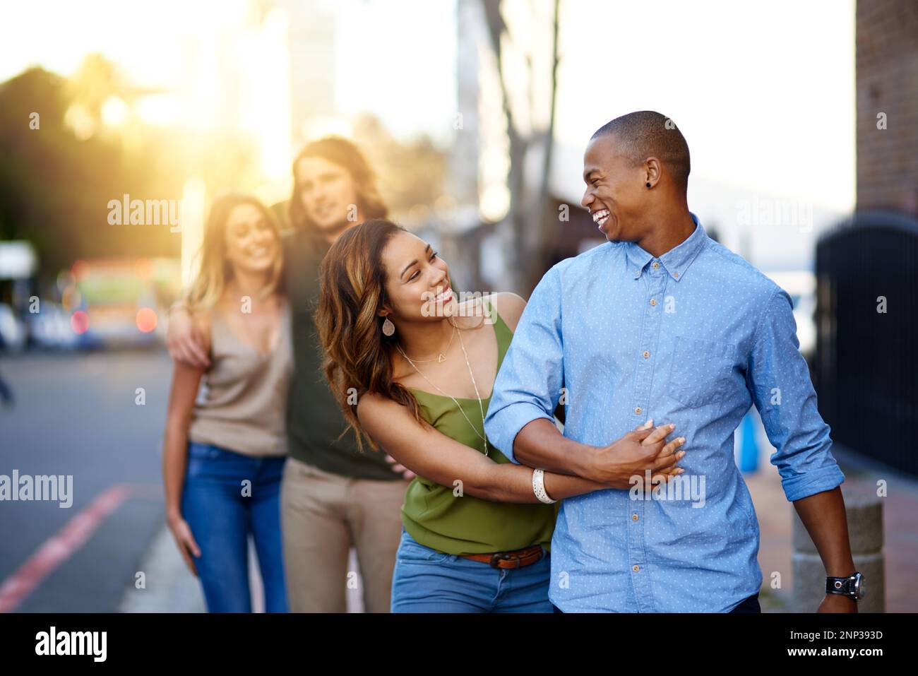 Love makes life so much sweeter. two happy young couples taking a walk ...