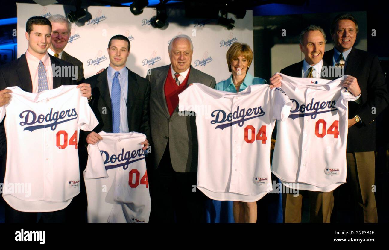 From left: Travis McCourt, Ross Porter, Tommy Lasorda, Jamie McCourt ...