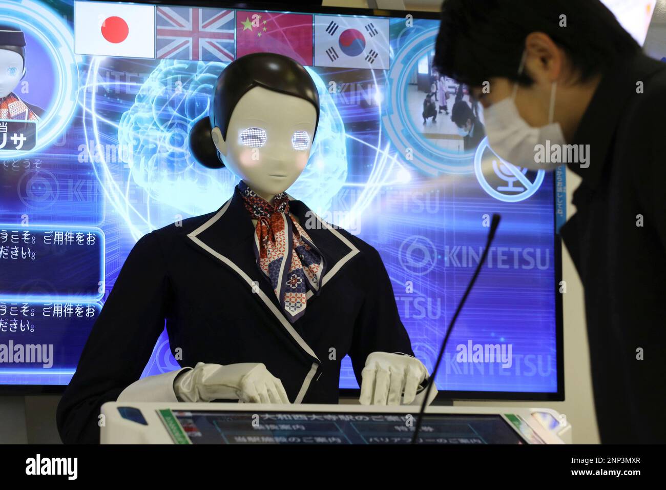 A robot ARISA welcomes visitors at Yamato Saidaiji Station in Nara on ...