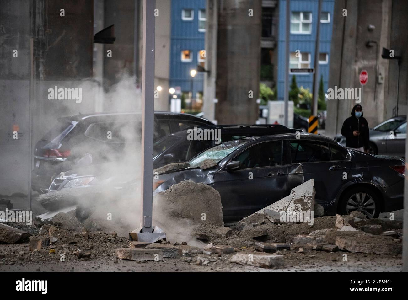 Smoke rises from the ground after an underground explosion occurred ...