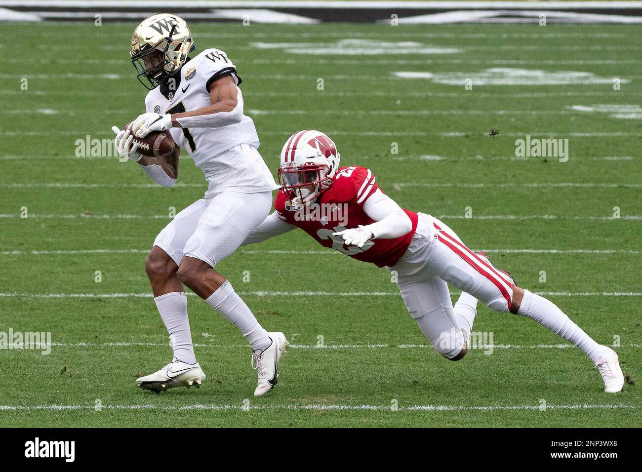 December 30, 2020: Wake Forest WR Donavon Greene (7) hauls in a pass in ...