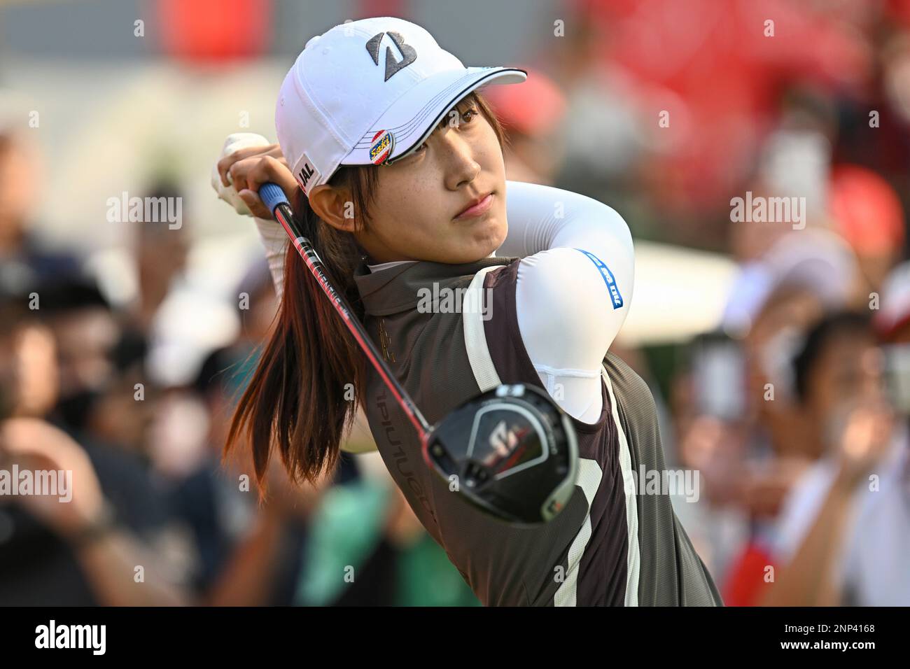 Saki Baba of Japan watches her shot on the first hole during the final ...