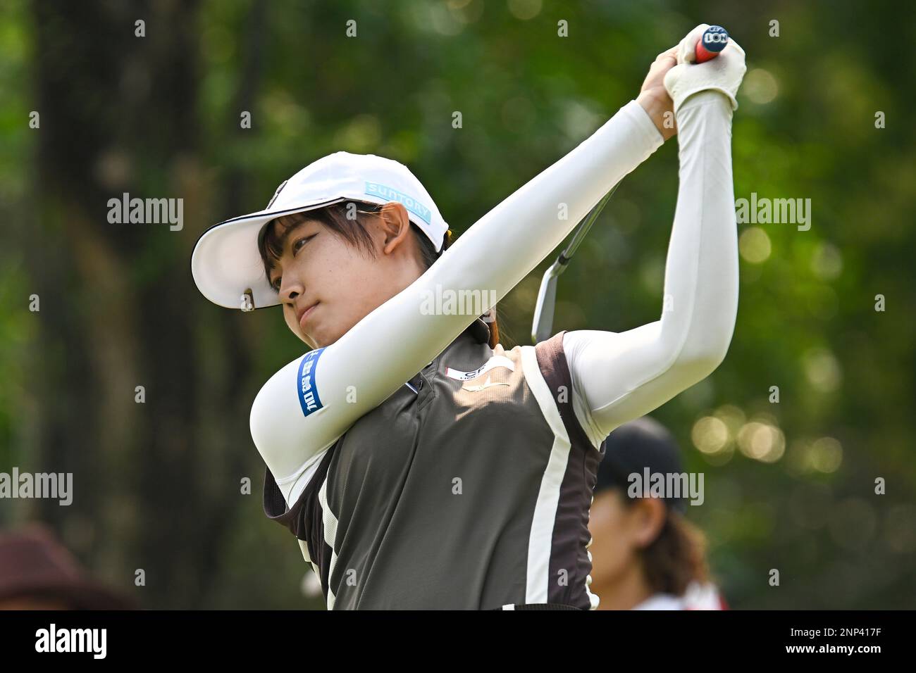 Saki Baba of Japan watches her shot on the 3rd hole during the final ...