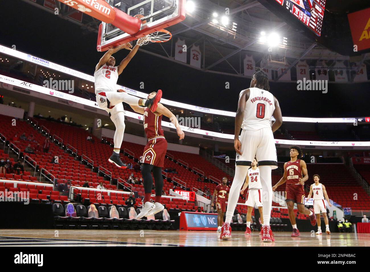 North Carolina State's Shakeel Moore (2) scores in the final seconds ...