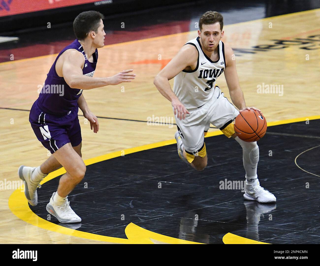 IOWA CITY, IA - DECEMBER 29: Iowa guard Jordan Bohannon (3) drives ...